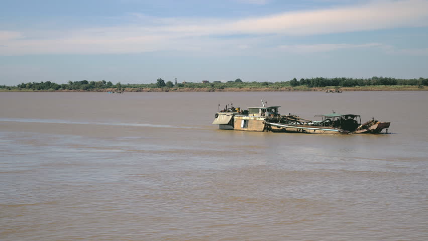 Dredging Boat Going Down The River Filled With Riverbed Sand Stock ... Dredging Boat Going Down The River Filled With Riverbed Sand Stock ...