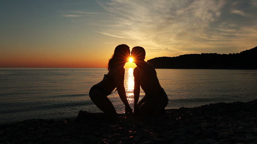 Couple Sitting Yoga On Beach While Sunset Stock Footage Video 3617660 Shutterstock