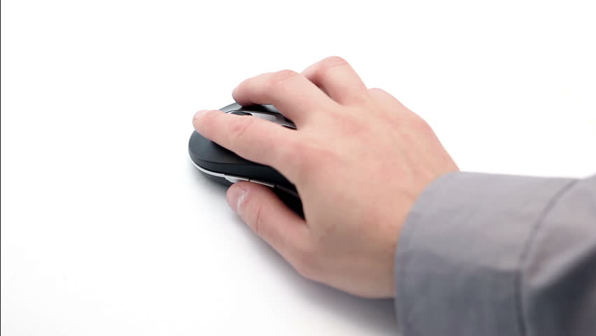 Hand Holding And Moving A Computer Mouse Against A White Background ... Hand Holding And Moving A Computer Mouse Against A White Background ...