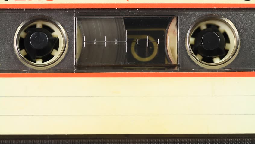 Audio Cassette Playing Inserting Cassette Tape With A Blank White Label In Use Playing Back In