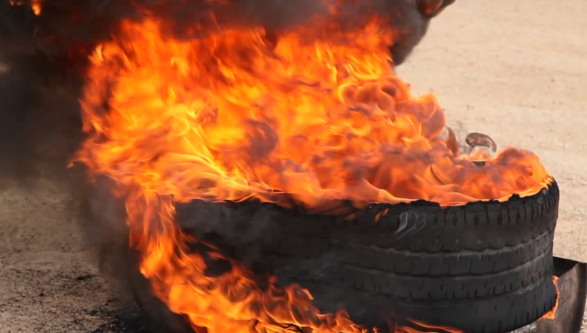 Burning Smoking Tire, Fire Destroys Tire Stock Footage Video 9318515 - Shutterstock