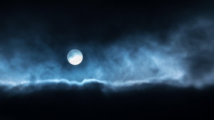 A Full Moon Over Clouds
