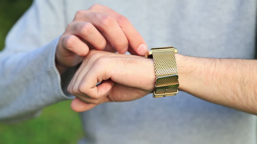 Man's Finger Tapping His Watch. He's Late Or He's Waiting. Stock ...