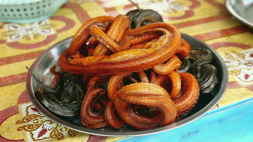 Various Species Of Deep Fried Snakes For Selling At Local Street Market ...