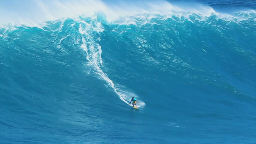 MAUI, HI - MARCH 13: Professional Surfer Yuri Soledade Rides A Giant ...