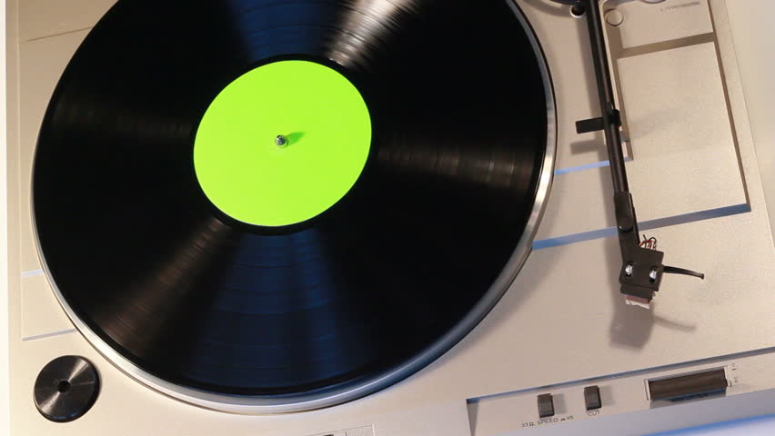 A Closeup View Of A Record Turntable With Green Screen Center For Text ...