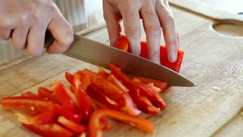 Woman Chopping Red Peppers In The Kitchen. Stock Footage Video 2054048 ...