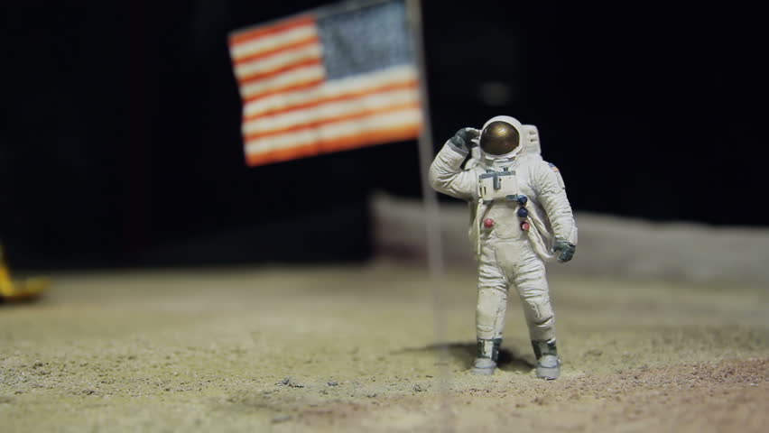 Astronaut Or Spaceman Working On Moon, Salute The USA Flag. Stock ...