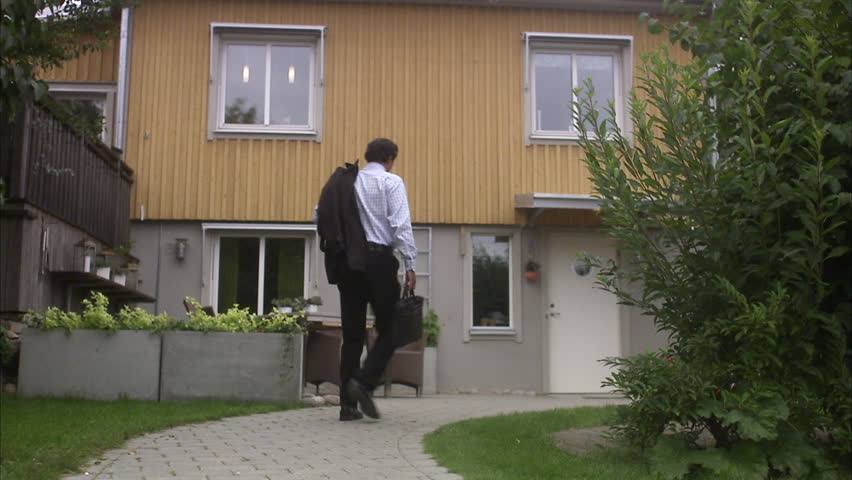 Man Walking Towards A House Stock Footage Video 2642825 - Shutterstock