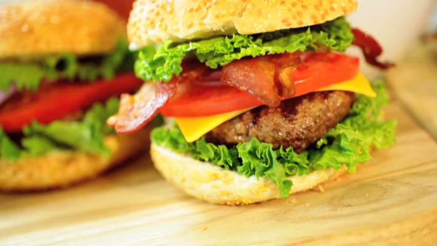 Fried Potato Chips Falling Down On Hamburger, Slow Motion, Fast Food ...