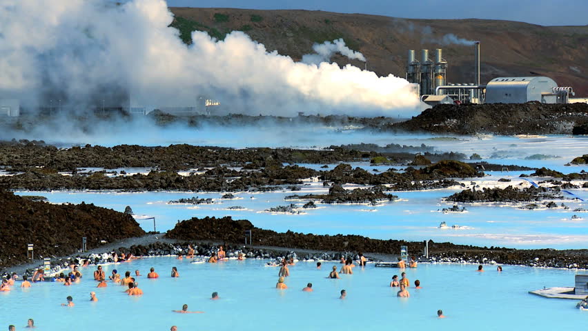 People Enjoying The Waters Of A Geothermal Hot Springs Spa With Steam ...