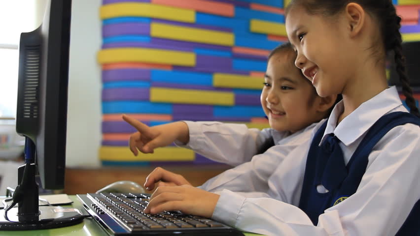 Little Asian Children Typing Computer Keyboard In Computer Class Stock ...