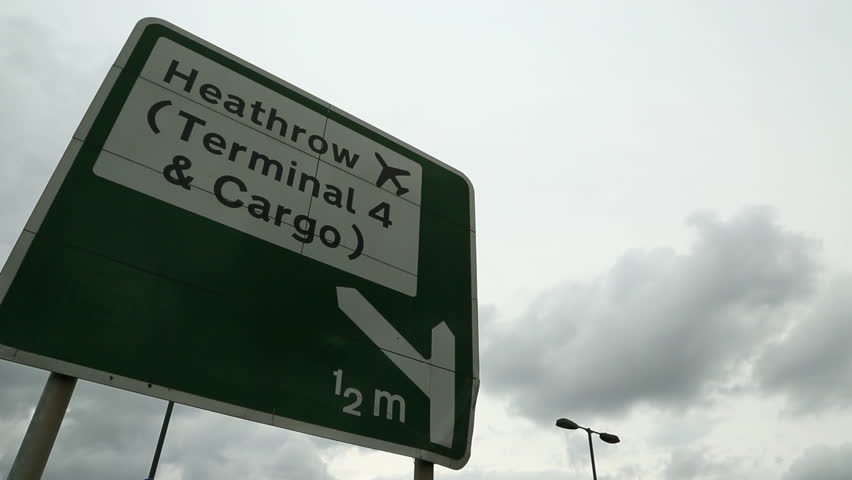 Heathrow Airport Sign With Aircraft Flyover Road Sign For London ...